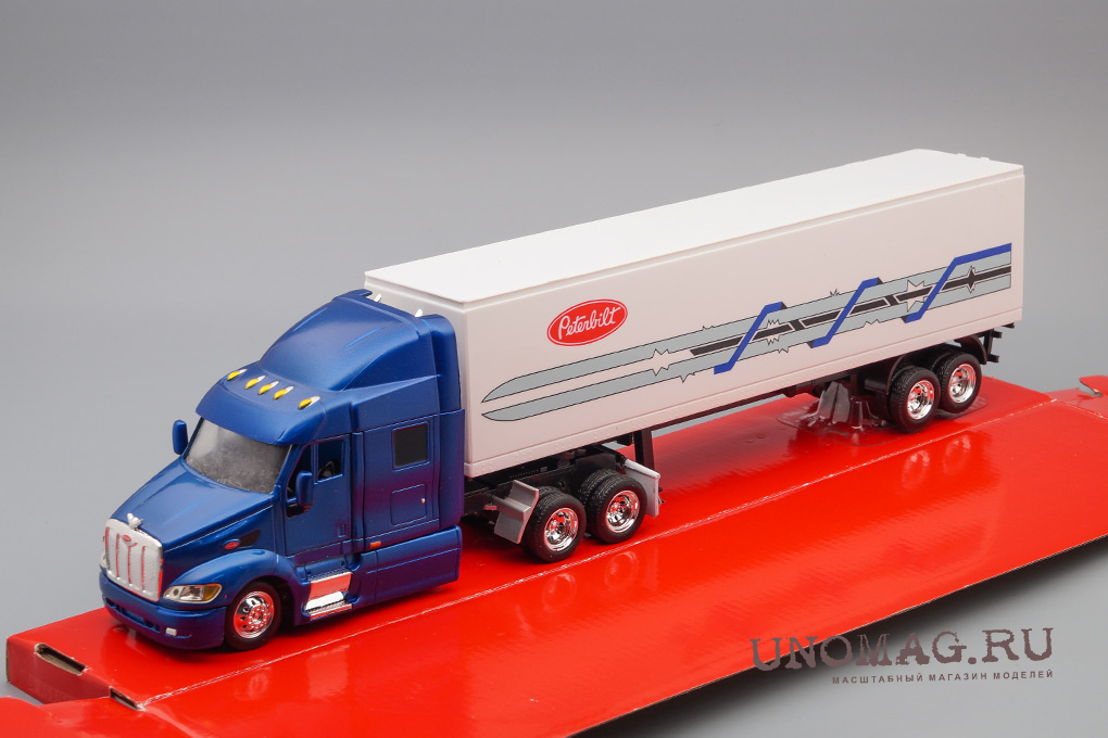 PETERBILT model 387 с полуприцепом, blue/white